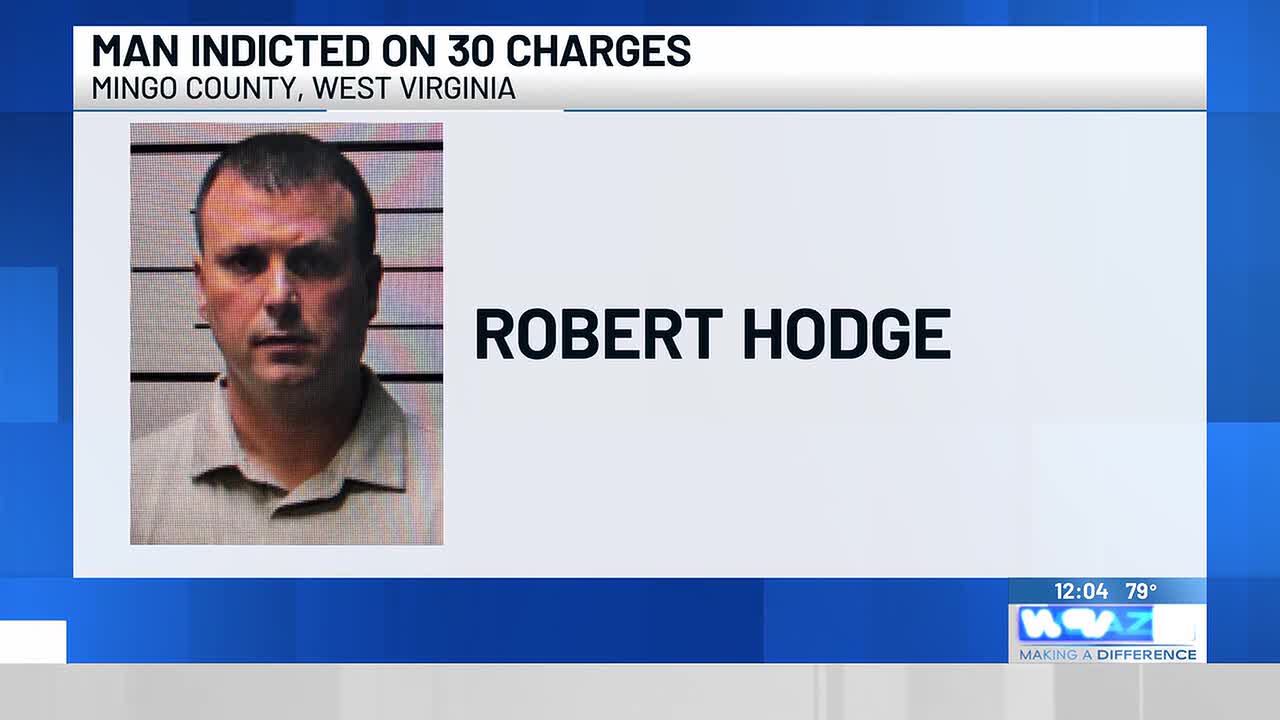 Assistant basketball coach indicted on 30 charges