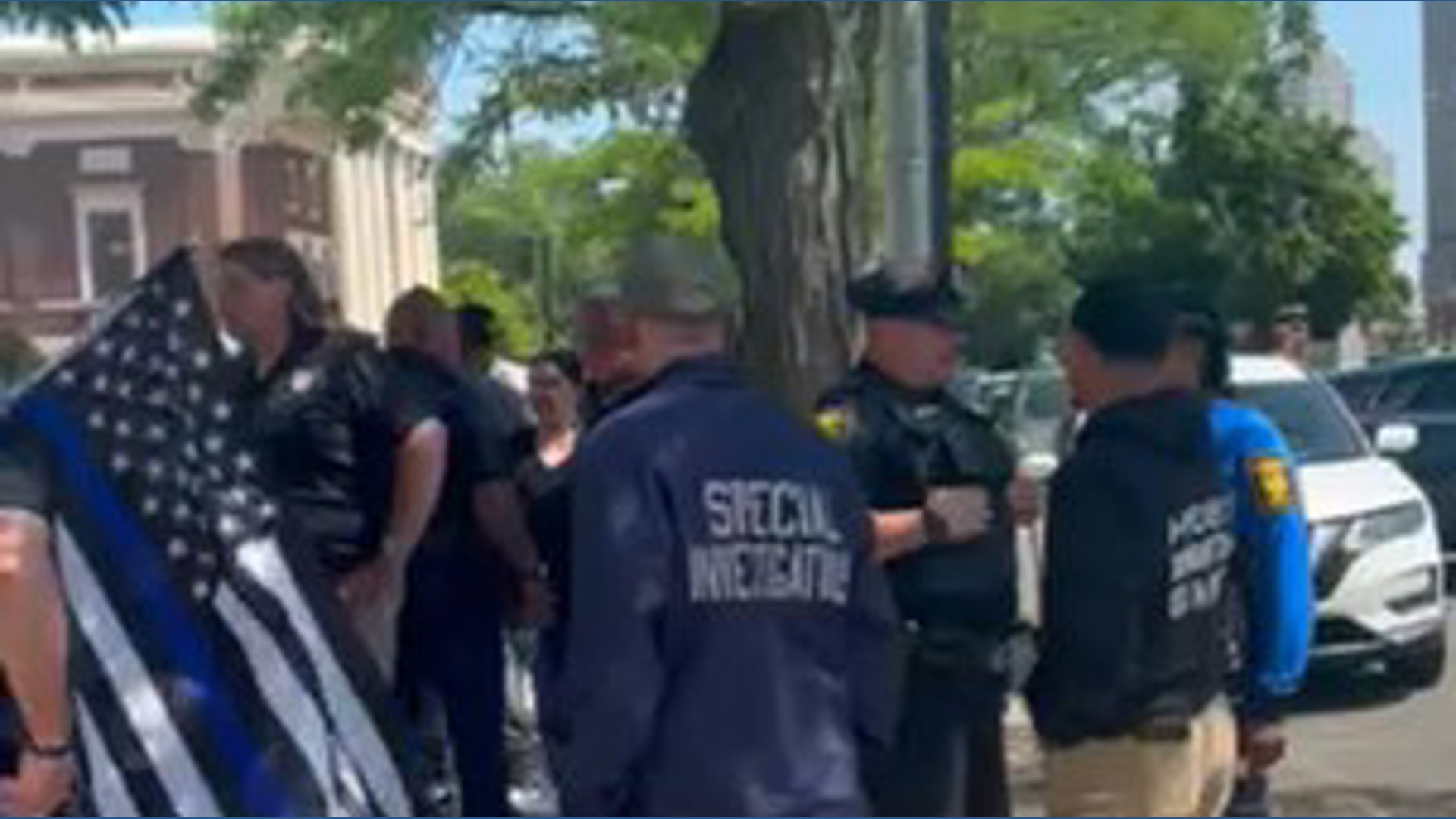 Supporters await ex-Hartford police officer's arrival outside courthouse
