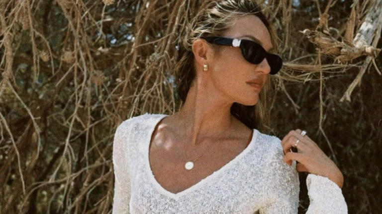 Model Candice Swanepoel turns heads with her sleek beach silhouette