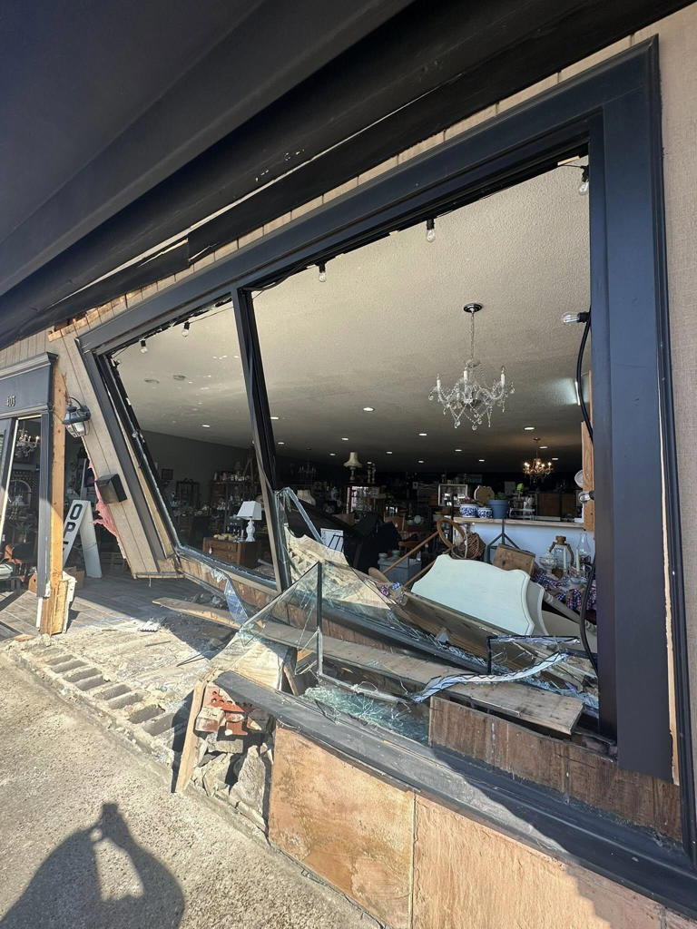Clinton antique store closes after car crashes through storefront