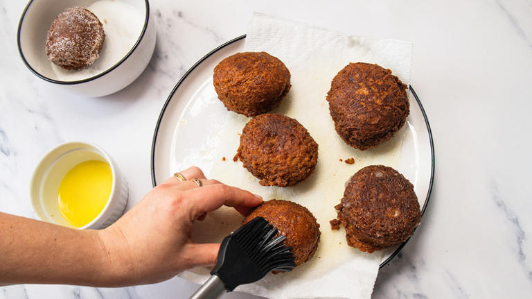 These jam-packed strawberry donuts get an extra flavor boost with a ...