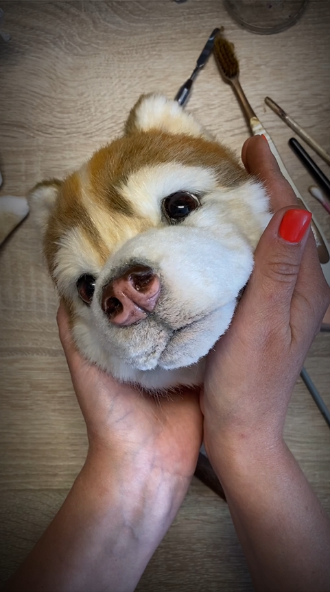 Dog sculpture brought to life with realistic acrylic tinting