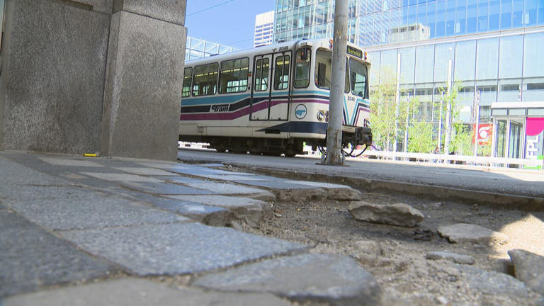 Cracked tiles and broken glass. Former downtown Calgary Hudson's Bay ...