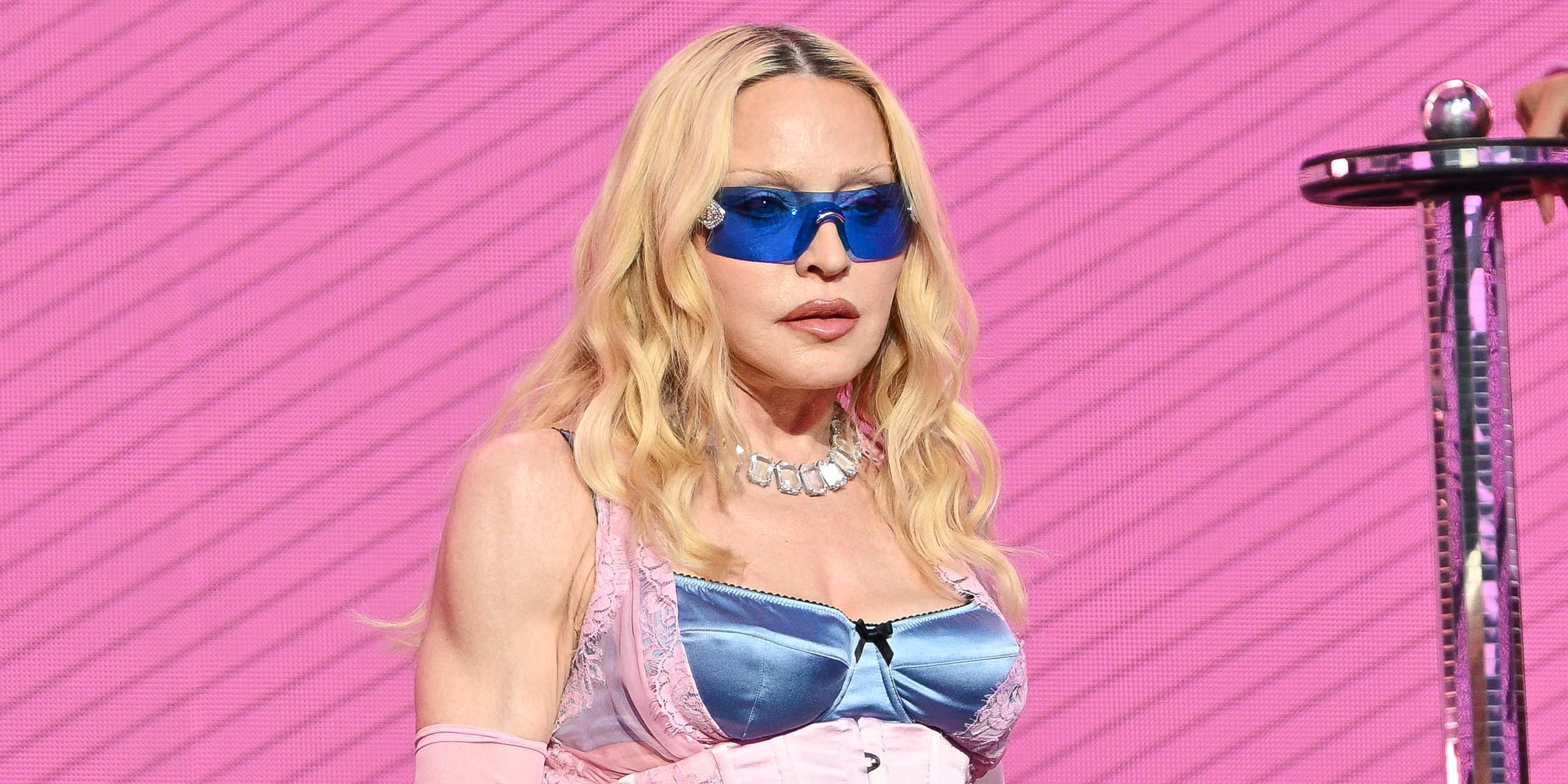 Madonna performs a surprise Times Square concert in cotton candy ...