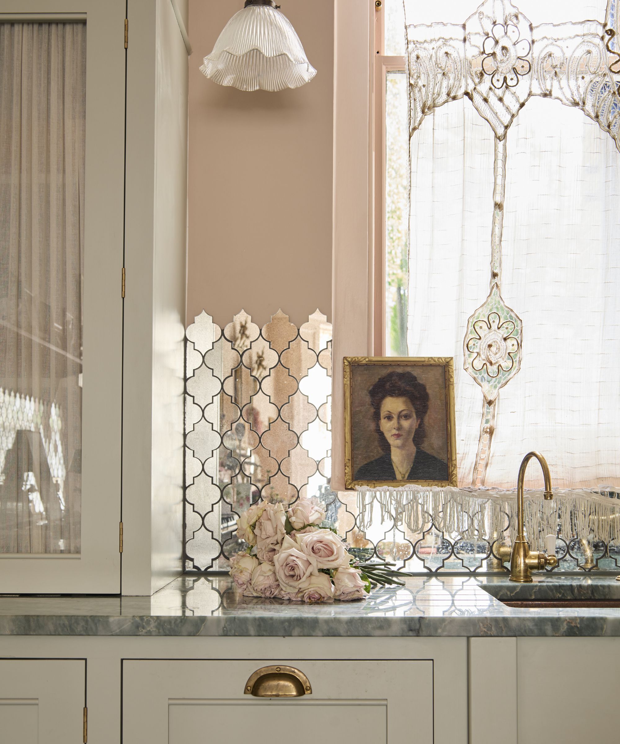 Pearl Lowe skipped subway tiles for a curved art deco backsplash that ...