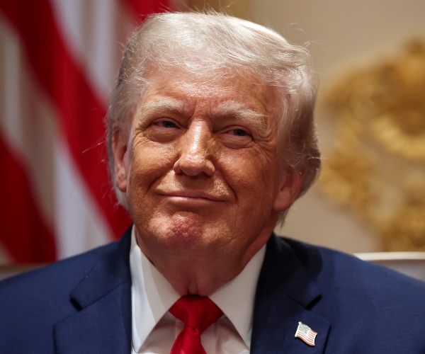 Trump cheers jobs report, rejects inflation fears