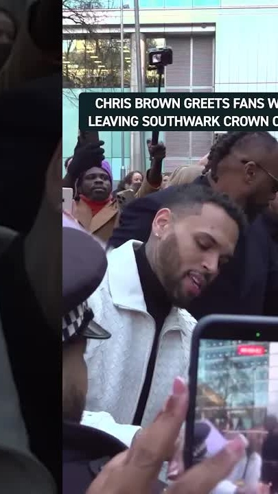 Chris Brown mobbed by fans leaving Southwark Crown Court