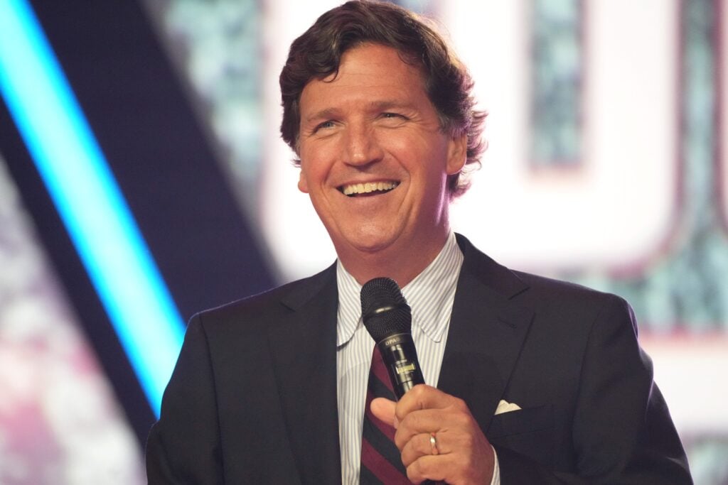 Tucker Carlson says 'people should stop paying their credit cards ...