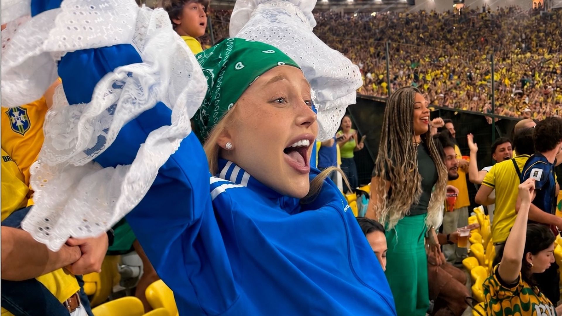 Pregnant, this Brazil supporter melts hearts online during a football match