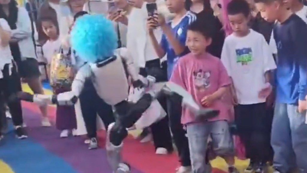 Chinese robot in clown wig roundhouse kicks child in viral video