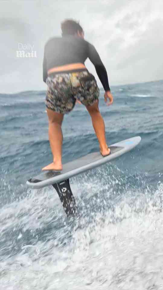 Thrillseeker navigates towering waves in open water