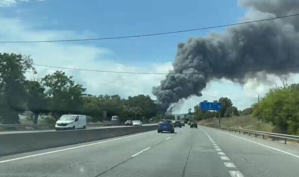 Santa Perpetua fire: Blaze at Barcelona Honda factory - huge plume of ...