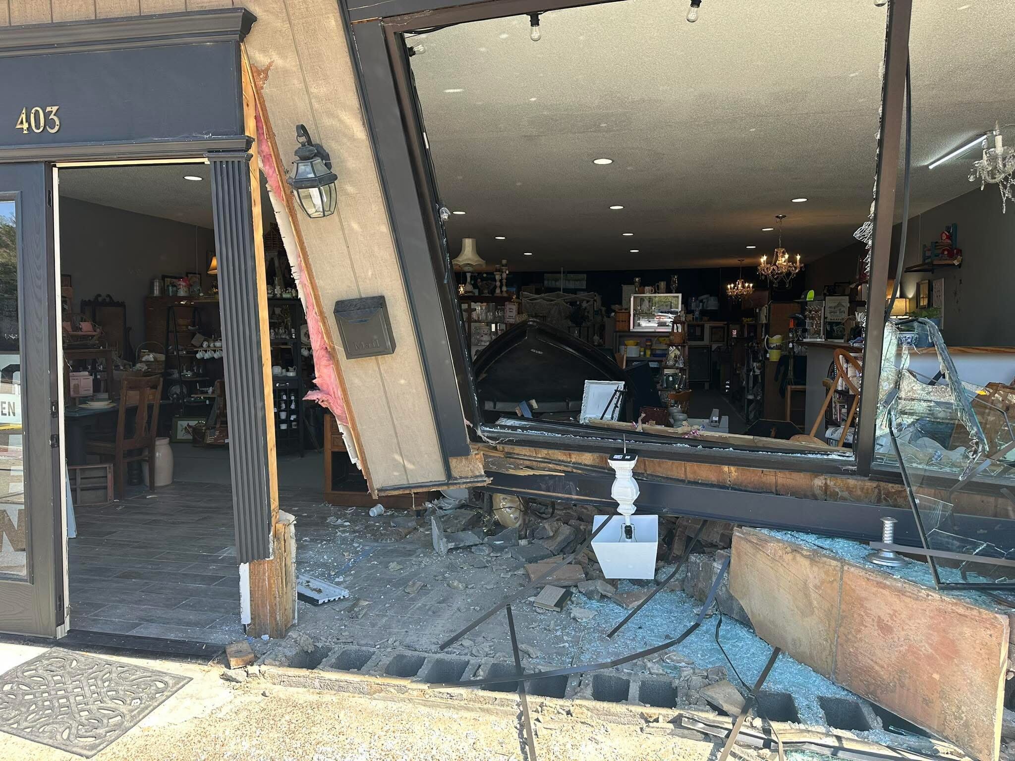 Clinton antique store closes after car crashes through storefront