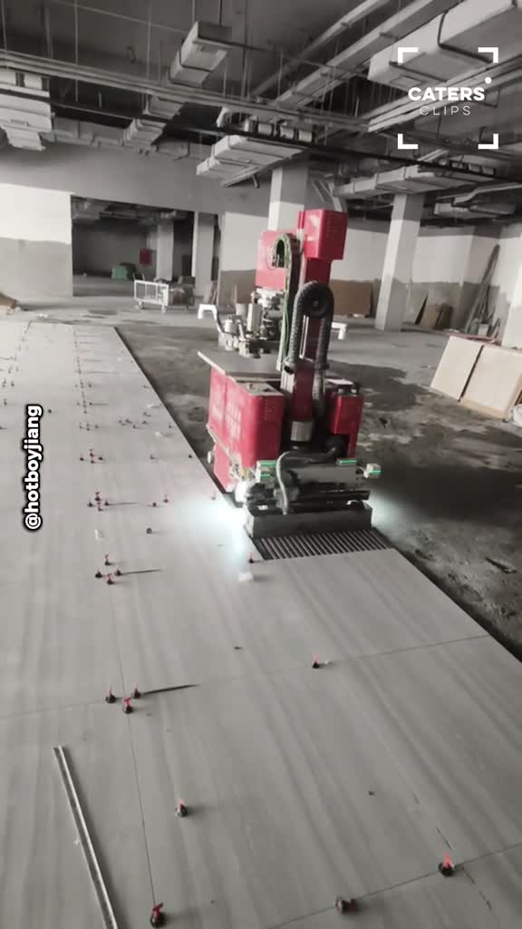 This construction robot can level floors and lay tiles automatically
