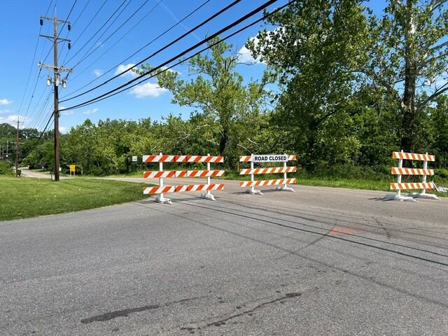 Road reopens after truck spills 275 gallons of sulfuric acid on West ...
