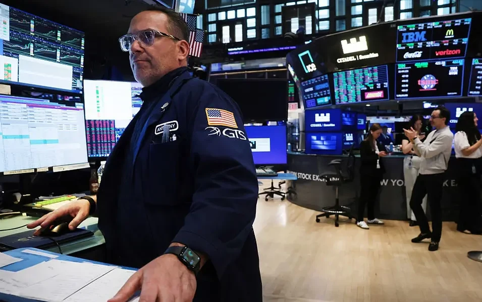 Dow hits record as investors rotate into industrials, healthcare
