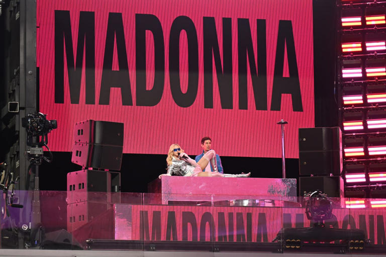 Madonna performs a surprise Times Square concert in cotton candy ...