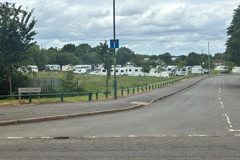 Residents 'on alert' after massive convoy of travellers set up camp at ...