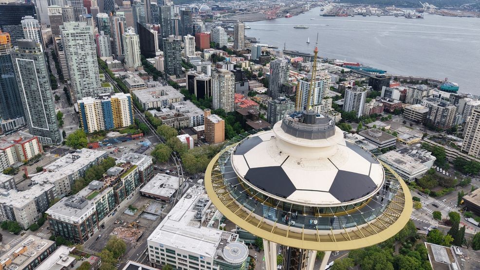 Hat trick: Seattle Space Needle adorned with soccer ball lid for World ...