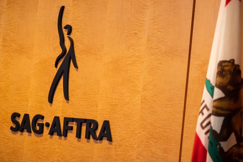 SAG-AFTRA members approve deal with major studios