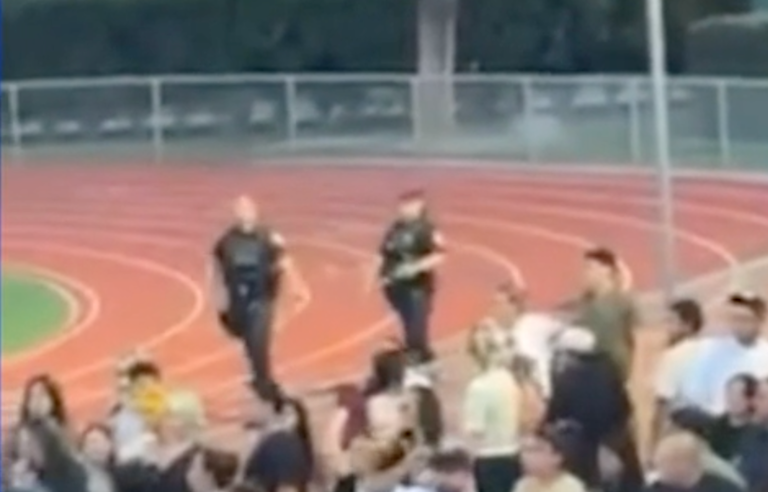 Brawl breaks out between cap-and-gown-wearing seniors at graduation