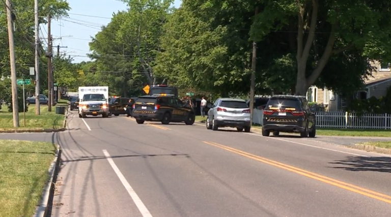 Man who allegedly waved knife at police, barricaded himself inside ...