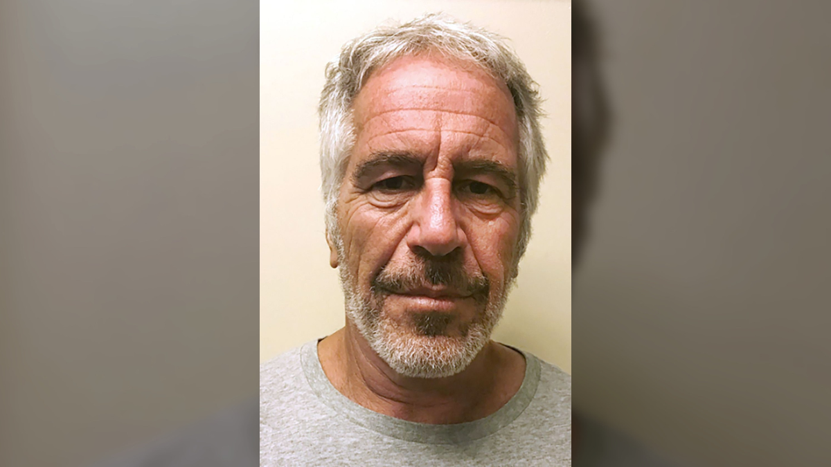 Jeffrey Epstein’s death: Orange figure seen near his jail cell in ...