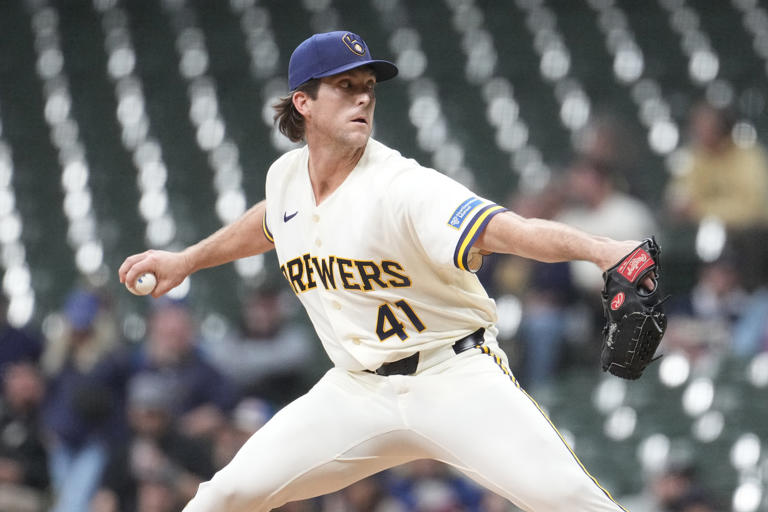Brewers designate Jake Woodford for assignment