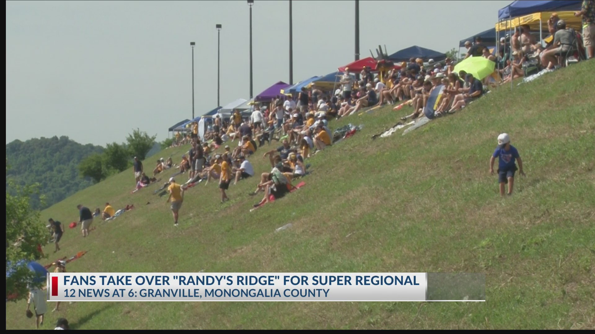 Plastic chairs and pepperoni rolls: WVU fans take over 'Randy's Ridge'