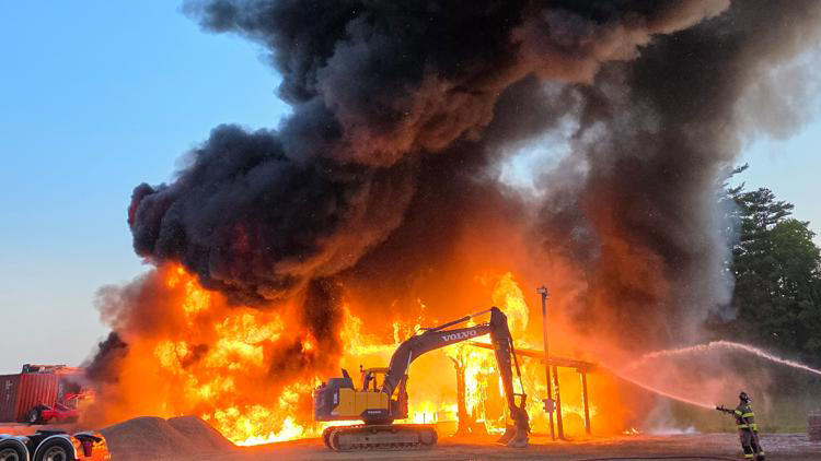 Fire heavily damages Randolph business barn, cause under investigation
