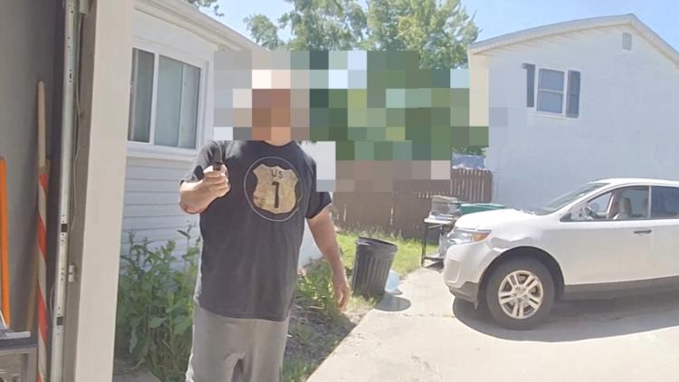 Body camera video shows Mentor standoff suspect advance on officer with ...