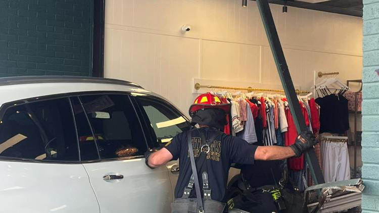 Car drives into store on the Square in Athens