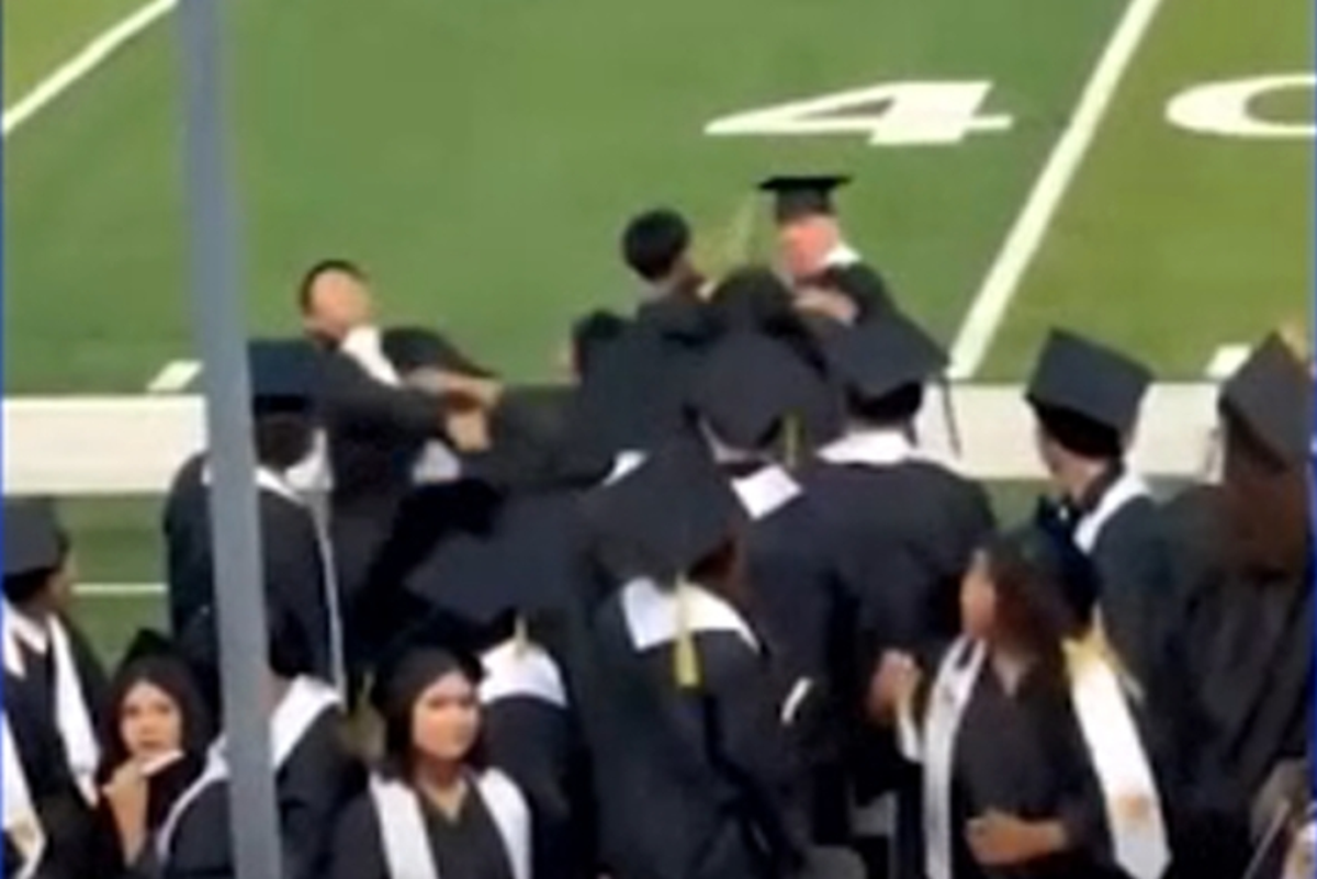 Brawl breaks out between cap-and-gown-wearing seniors at graduation