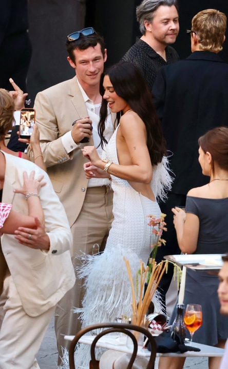 Dua Lipa transforms her favorite designer it bag into a wedding gown