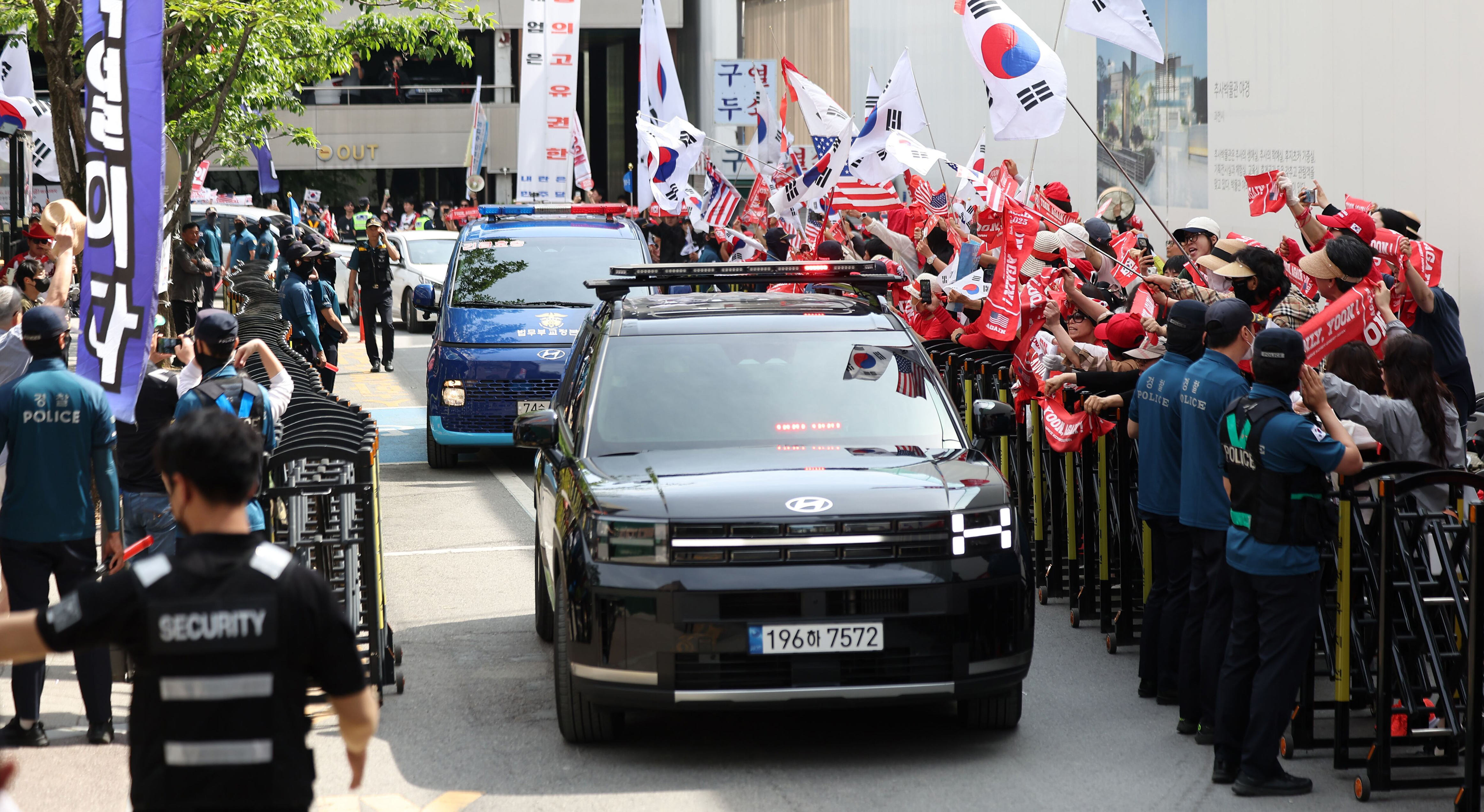 Former president Yoon summoned over martial law justification