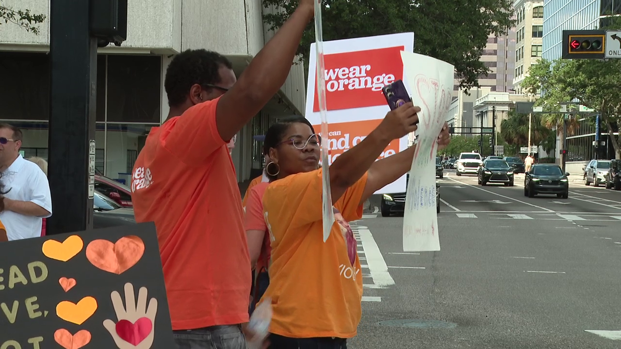Tampa advocates call for change on gun violence during Wear Orange Weekend