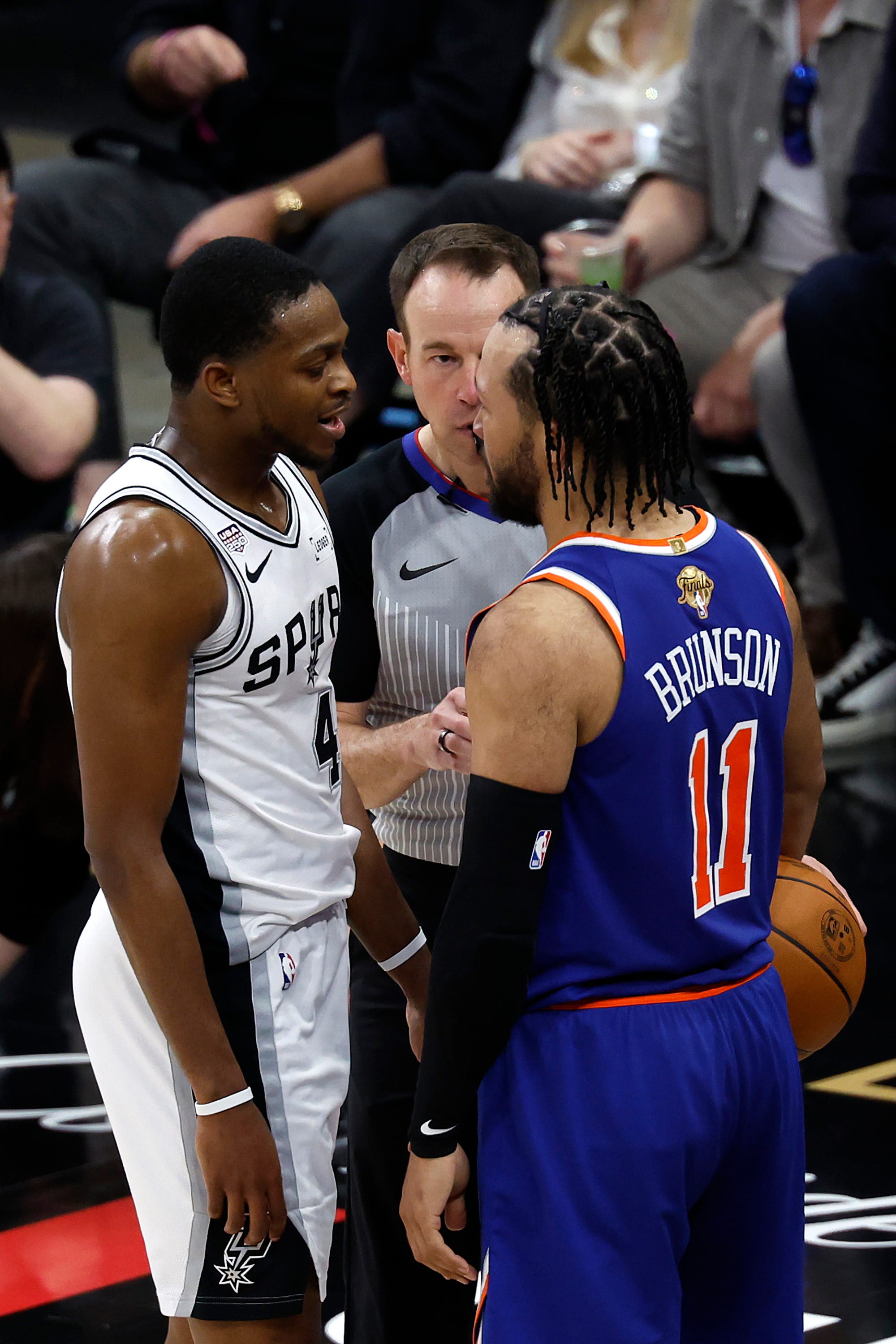 Jalen Brunson, De'Aaron Fox stare each other down in heated NBA Finals ...