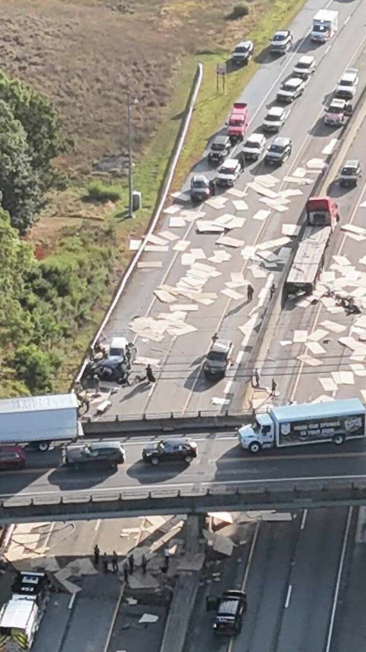 Texas truck driver charged in I-95 plywood spill in Westbrook that ...