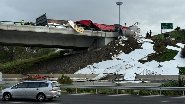 Two drivers injured as truck rollover forces closure of Melbourne's ...