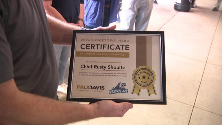 Walker fire chief honored during West Michigan Whitecaps game Friday