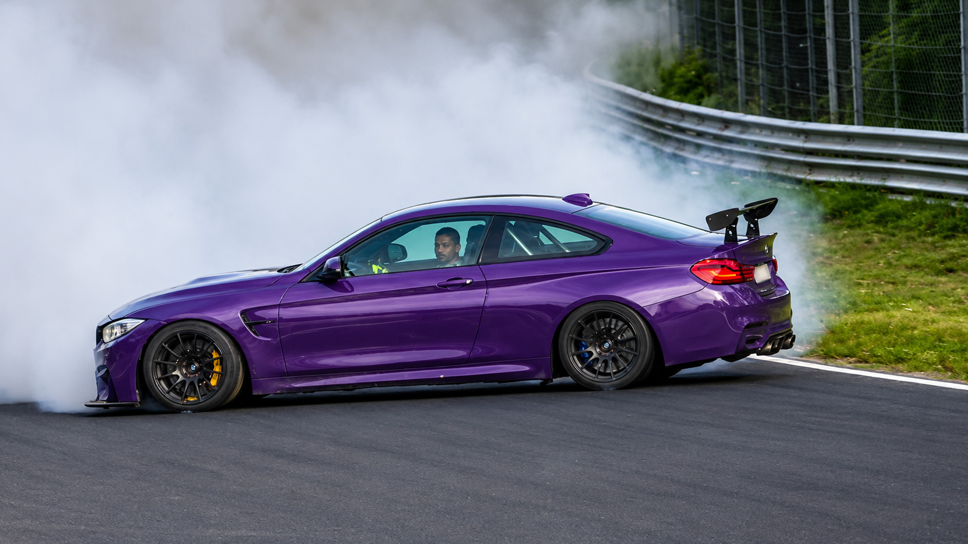 BMW M4 nearly crashes after brutal slide during track run