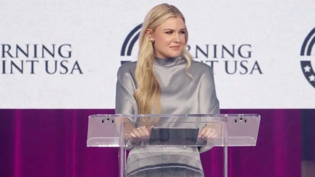 Erika Kirk's TPUSA speech interrupted by heckler claiming she 'protects ...