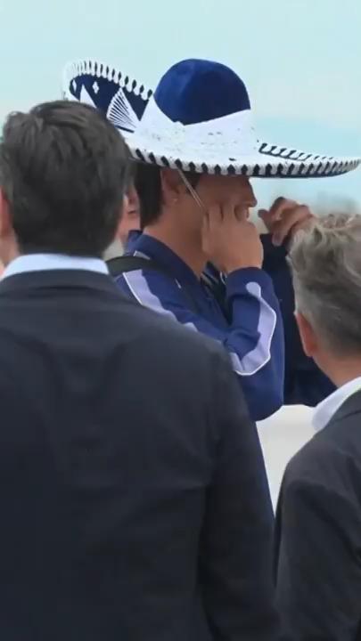 Son and Korean teammates get sombreros as they land in Guadalajara