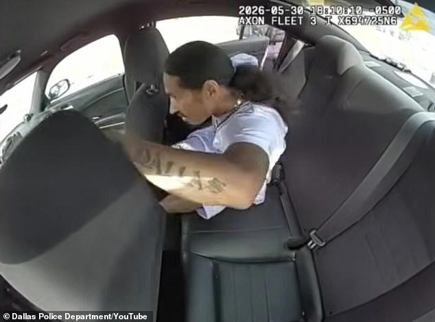 Wild moment suspect jumps into front seat of police car and drives off ...
