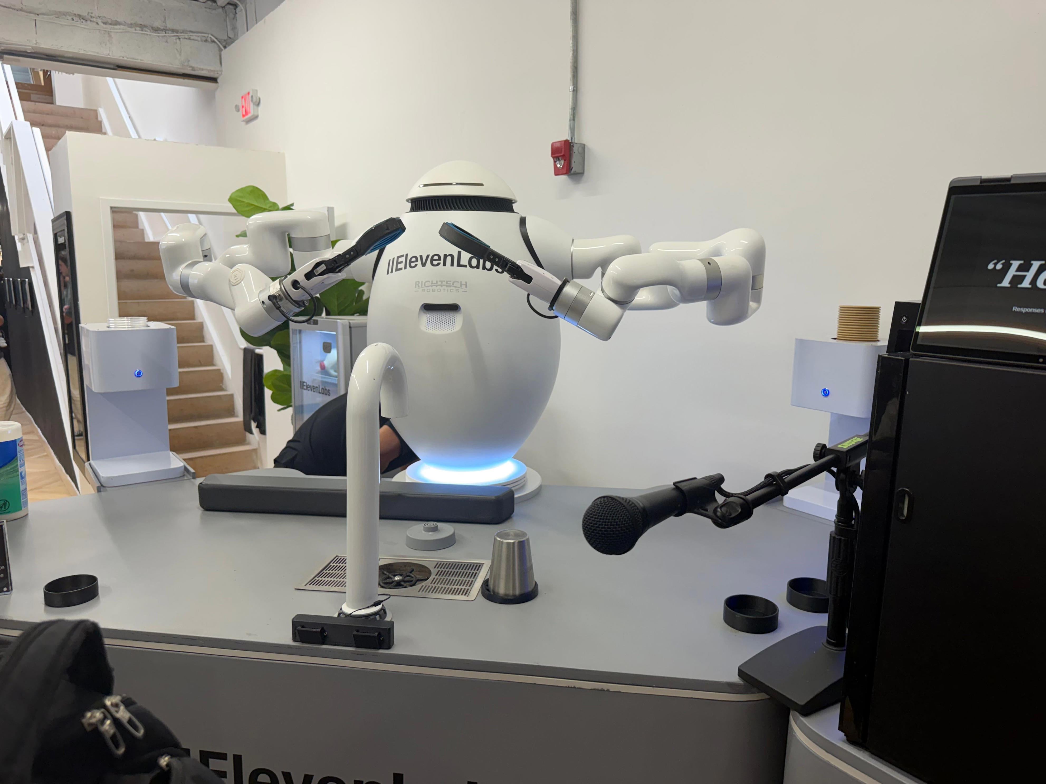 I went to ElevenLabs' NYC pop-up. A robot poured me cold brew before I ...