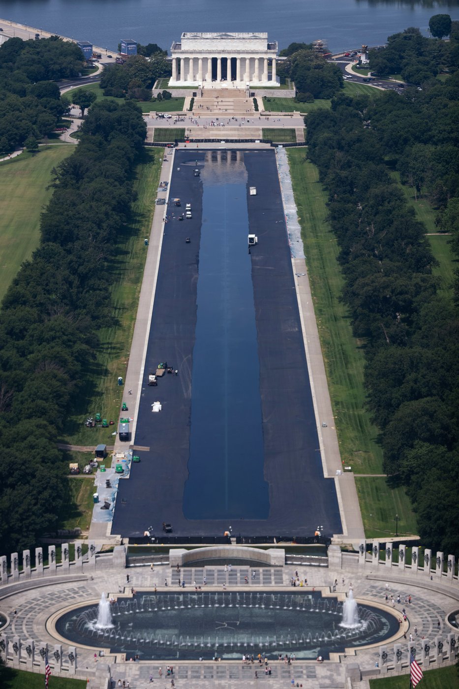 Refilling starts for newly painted Reflecting Pool in Washington, in photos