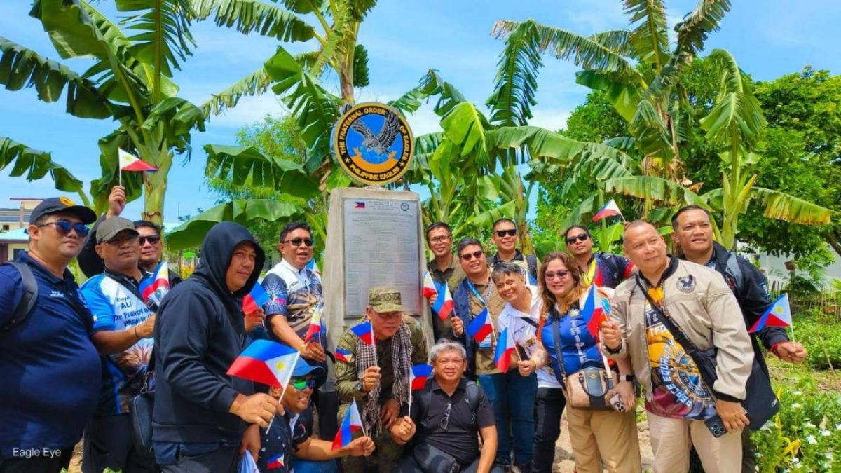 Civic group installs first civilian marker on Pag-asa Island, donates ...