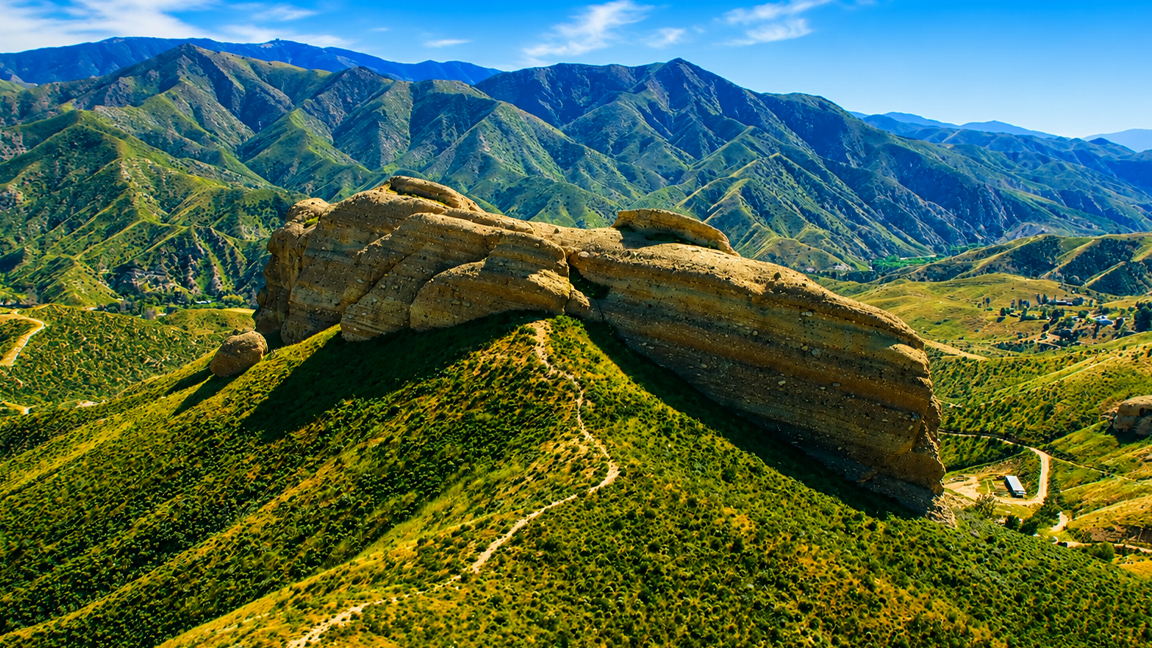 How did this massive rock end up on top of the hills?