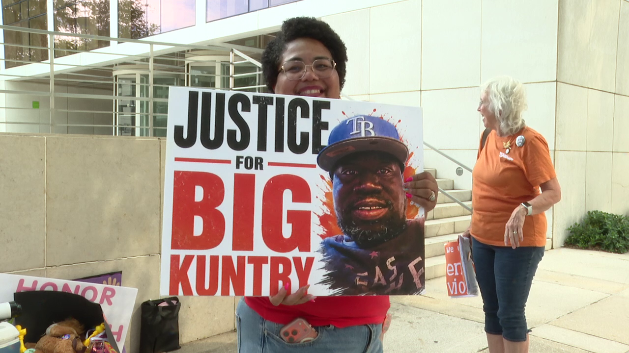 Tampa advocates call for change on gun violence during Wear Orange Weekend