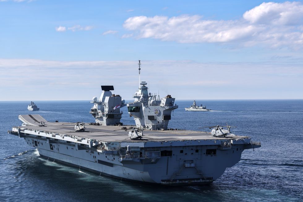 Royal Navy's flagship aircraft carrier left 'marooned' after breaking ...